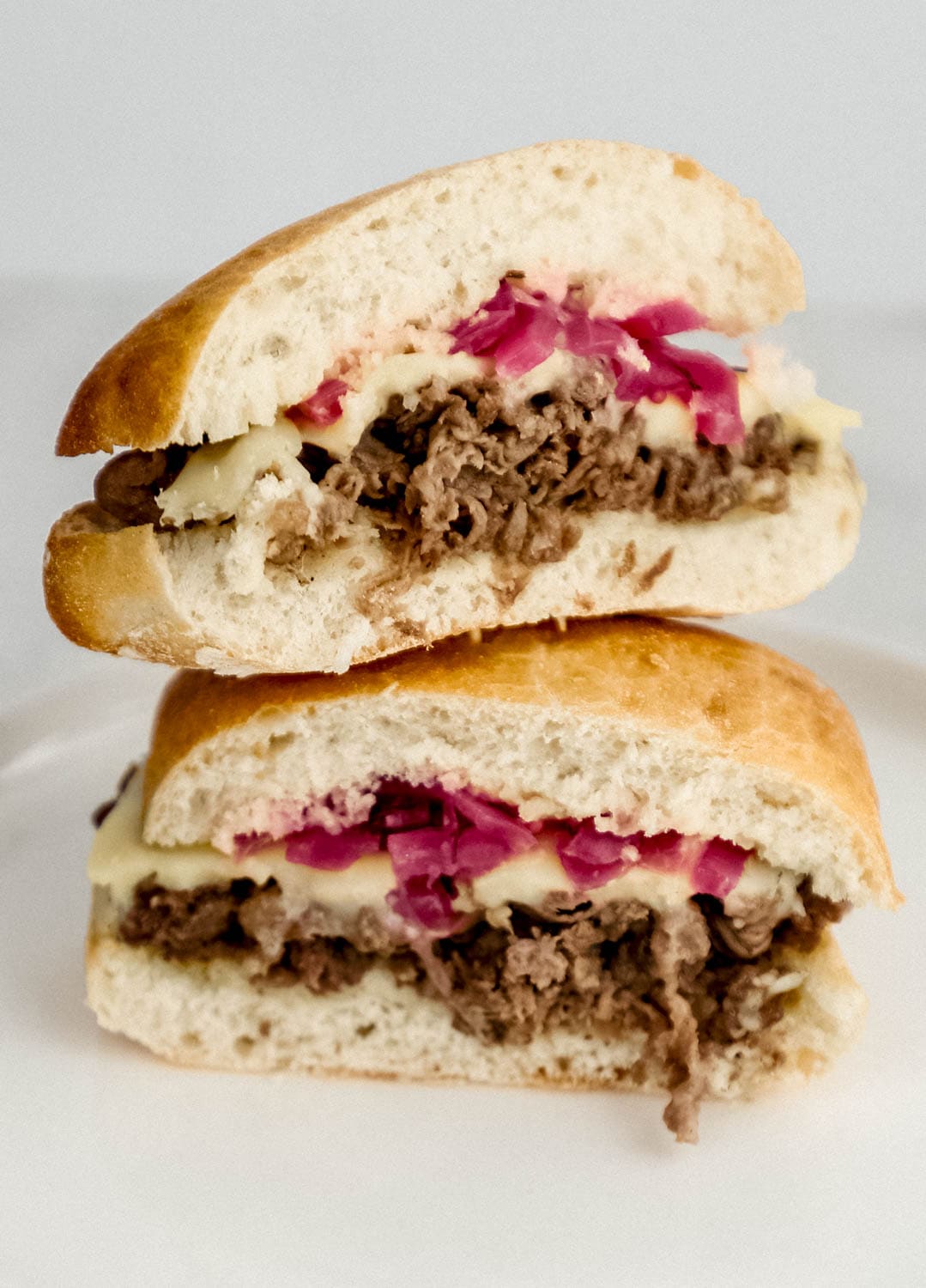 Toasted Steak Sandwich with White Cheddar and Pickled Onions